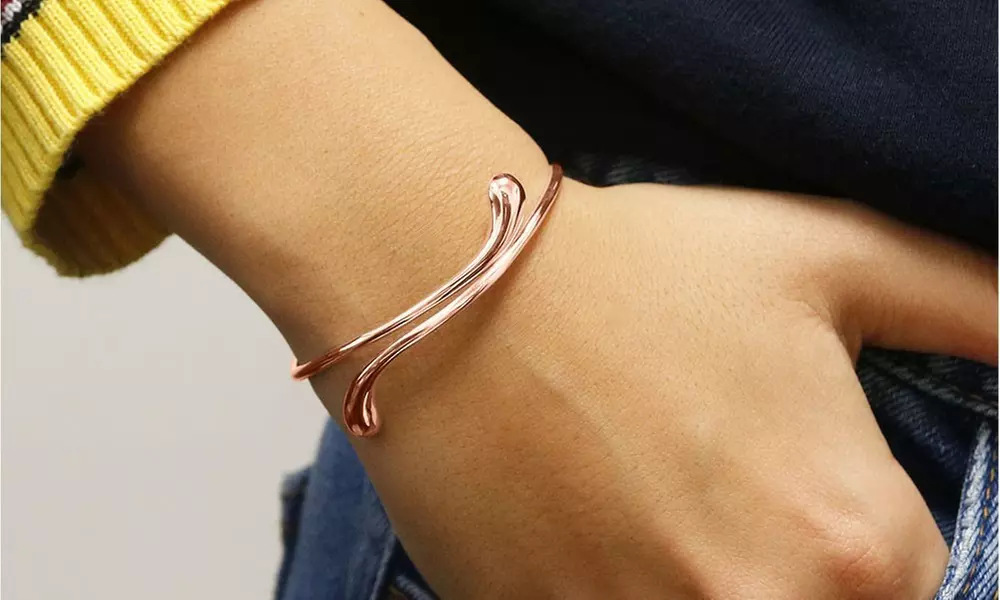 Up To 67% Off on Teardrop Open Cuff Bangle Fle... | Groupon Goods